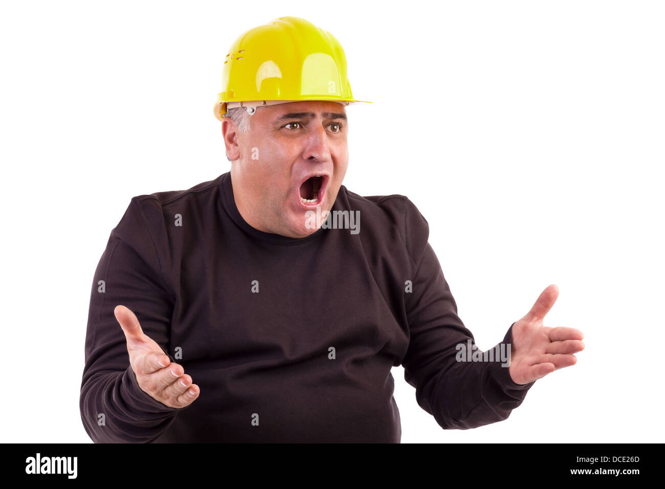 Angry construction worker looking at something isolated on white ...