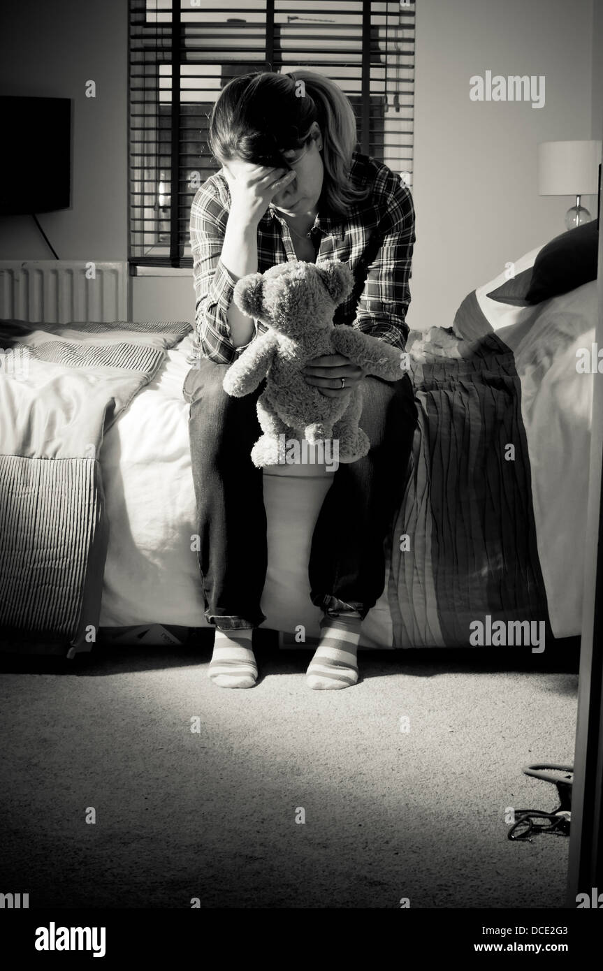 Devastated mother hi-res stock photography and images - Alamy