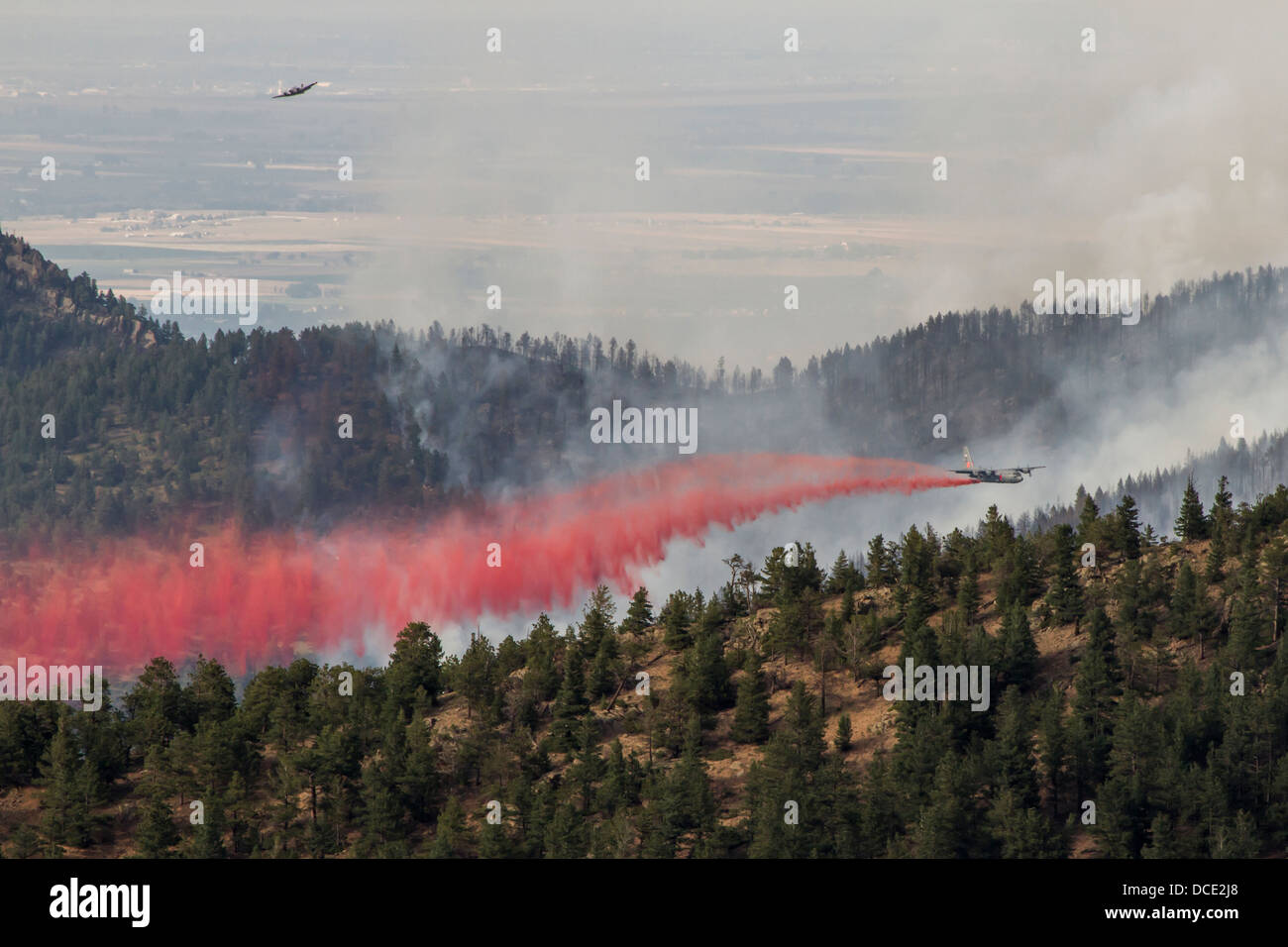 USA, Colorado, Boulder, Flagstaff Fire, Pilot Plane with Slurry Bomber ...