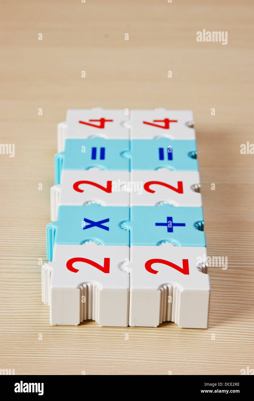 School cubes with math problems on the table Stock Photo - Alamy