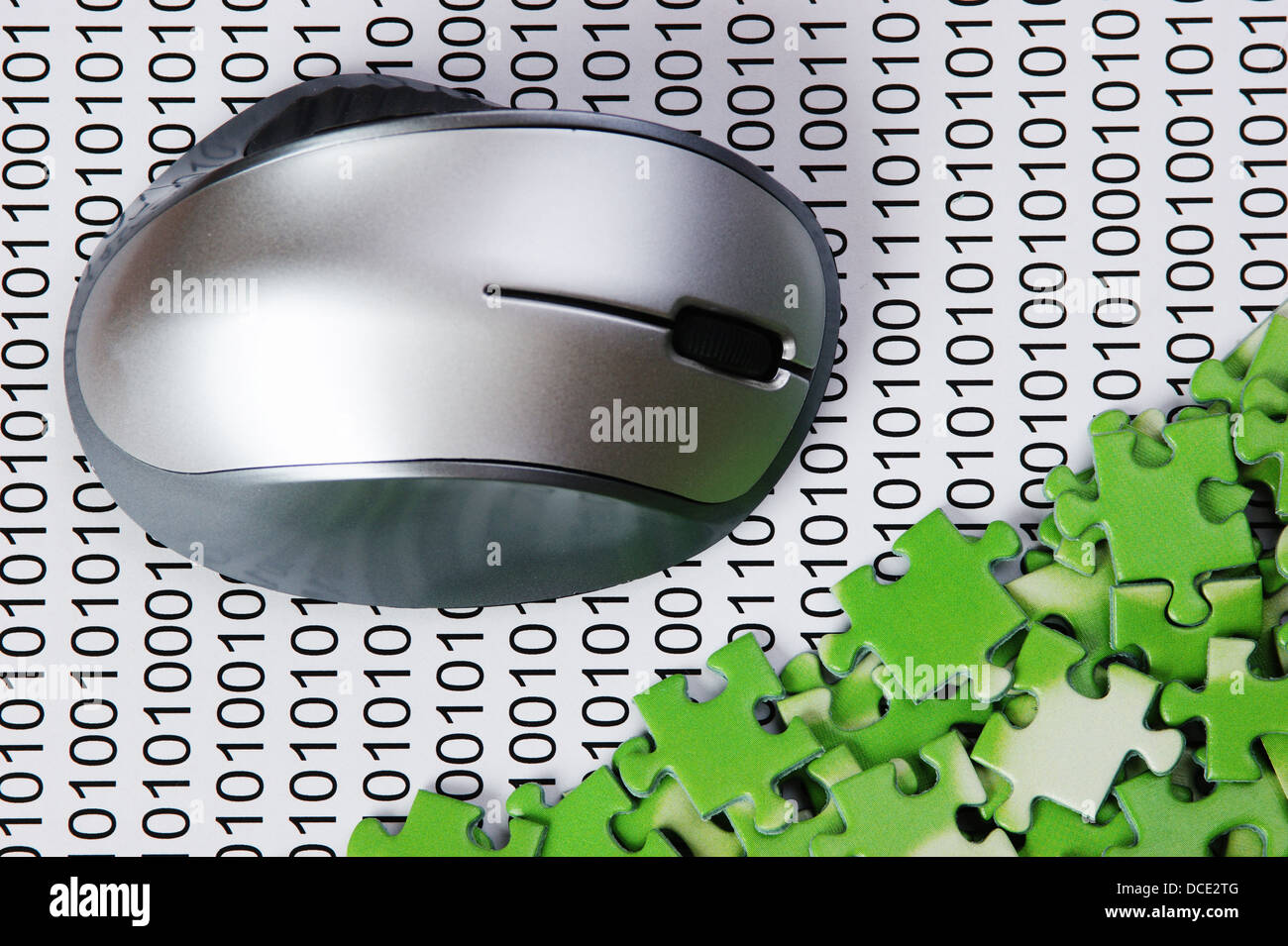 computer mouse and puzzles on a binary code Stock Photo - Alamy computer mouse and puzzles on a binary code Stock Photo - Alamy