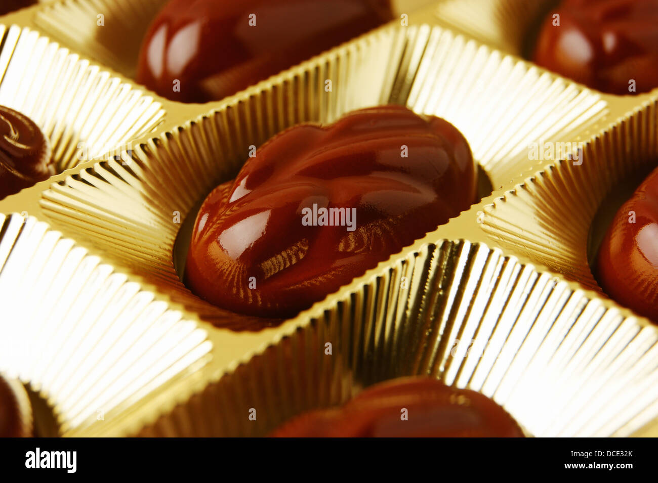 Gift box in gold hi-res stock photography and images - Alamy