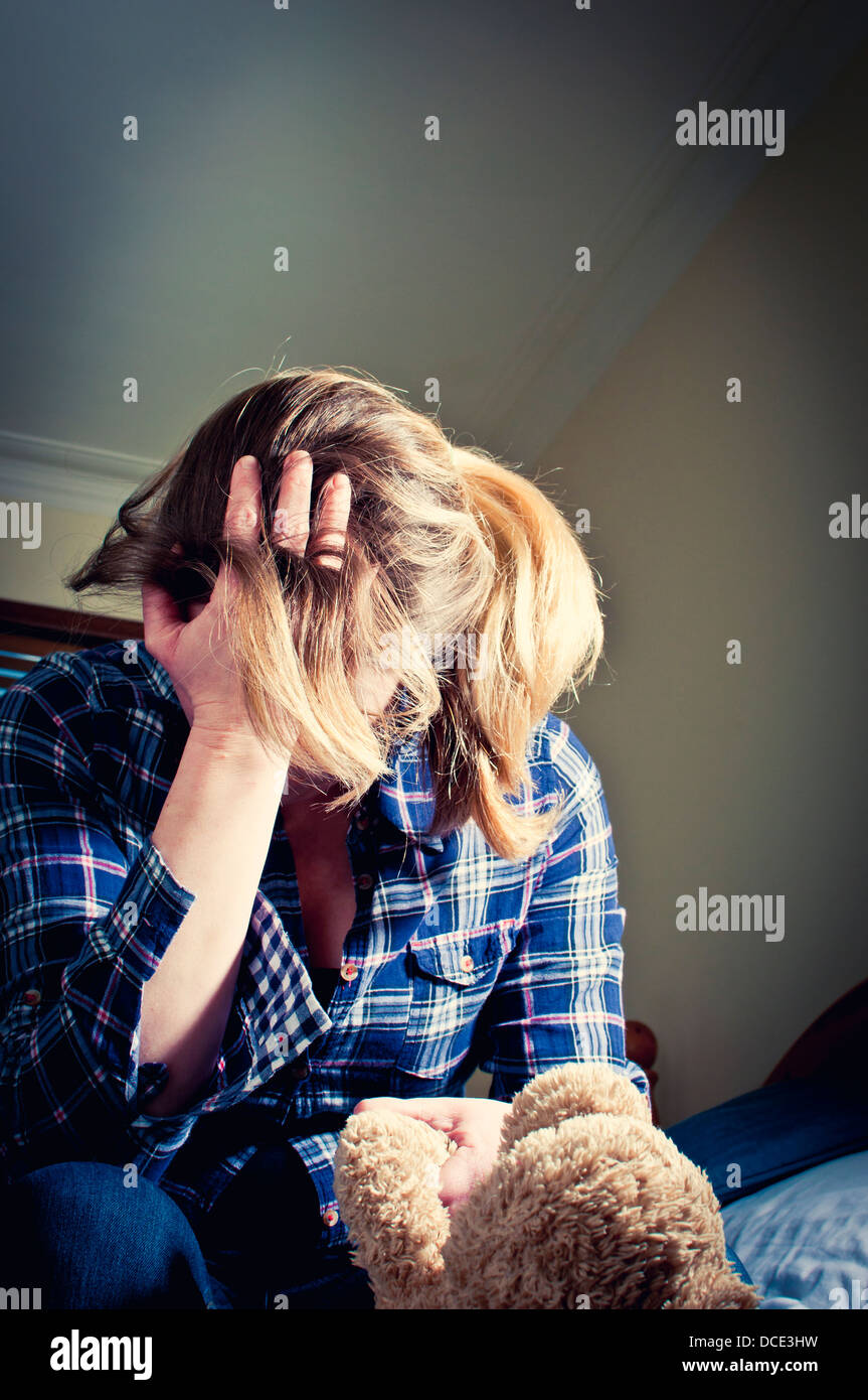 Sad woman hi-res stock photography and images - Alamy