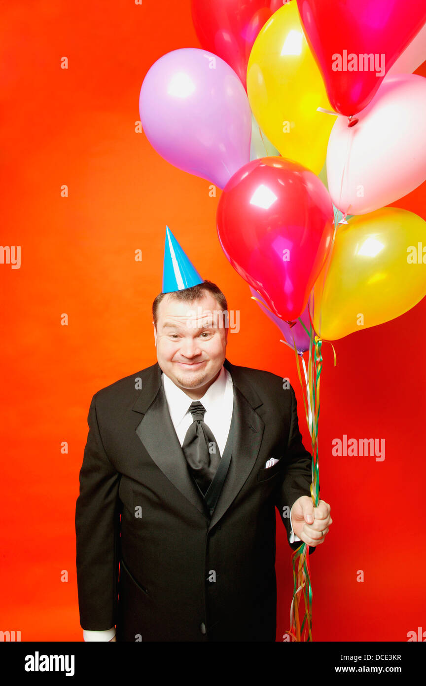 Man With Balloons Stock Photo - Alamy