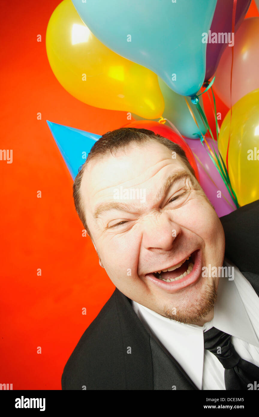 Man With Balloons Stock Photo - Alamy