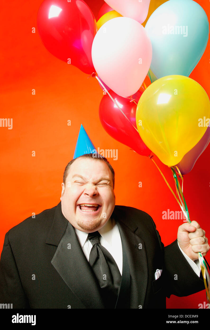 A Man With Balloons Stock Photo - Alamy