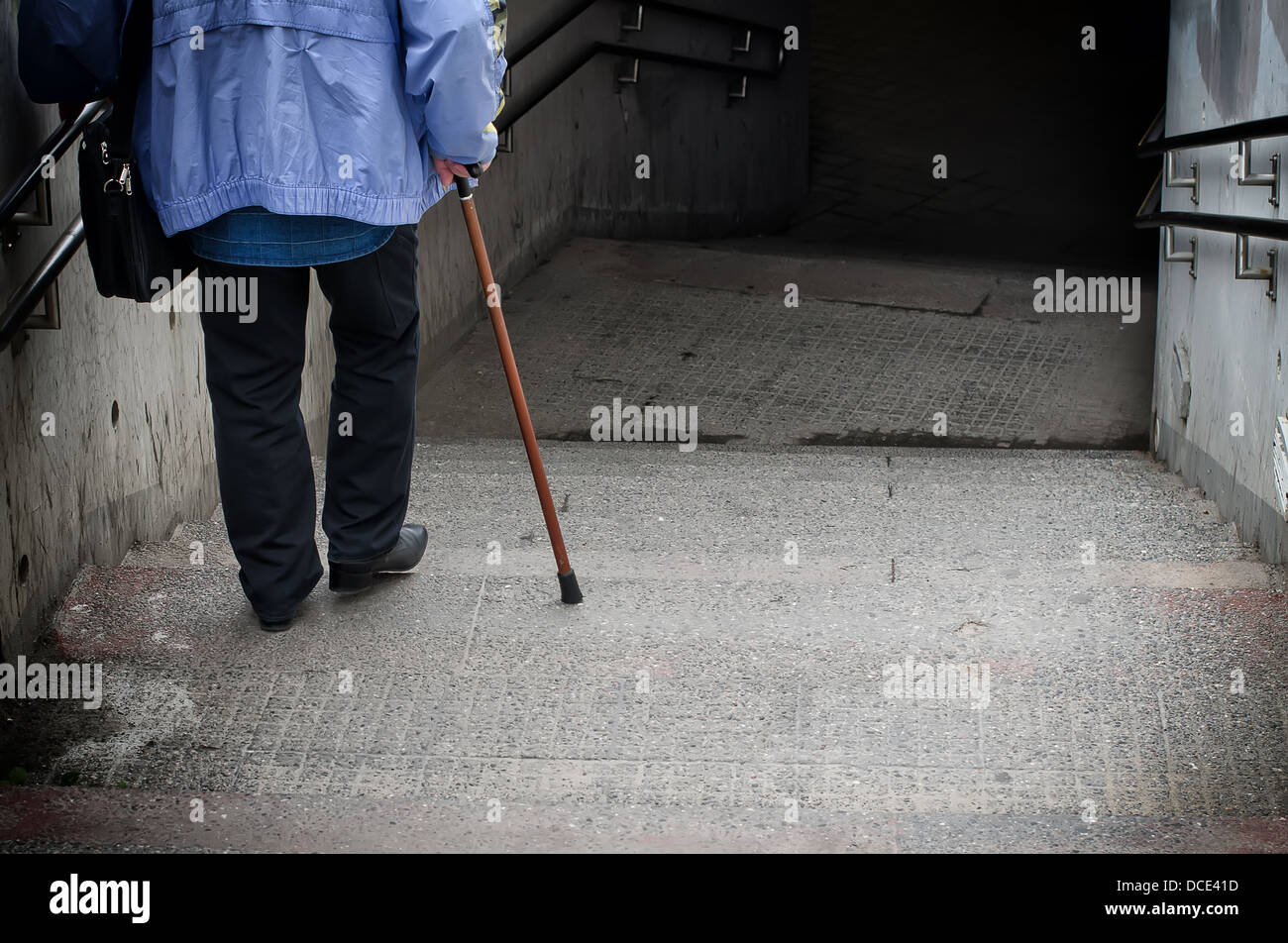 Man coming down stairs hi-res stock photography and images - Alamy
