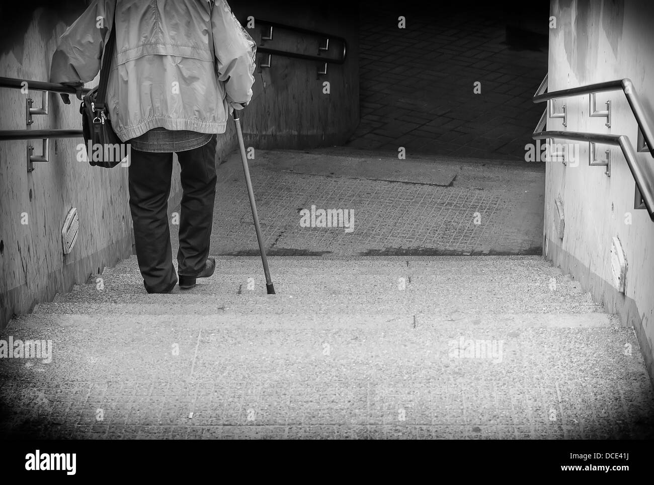 Man coming down stairs hi-res stock photography and images - Alamy