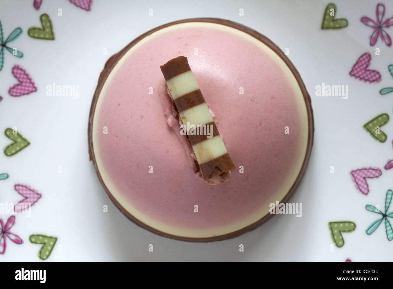 Layered strawberry and vanilla flavoured white chocolate mousse hi-res ...