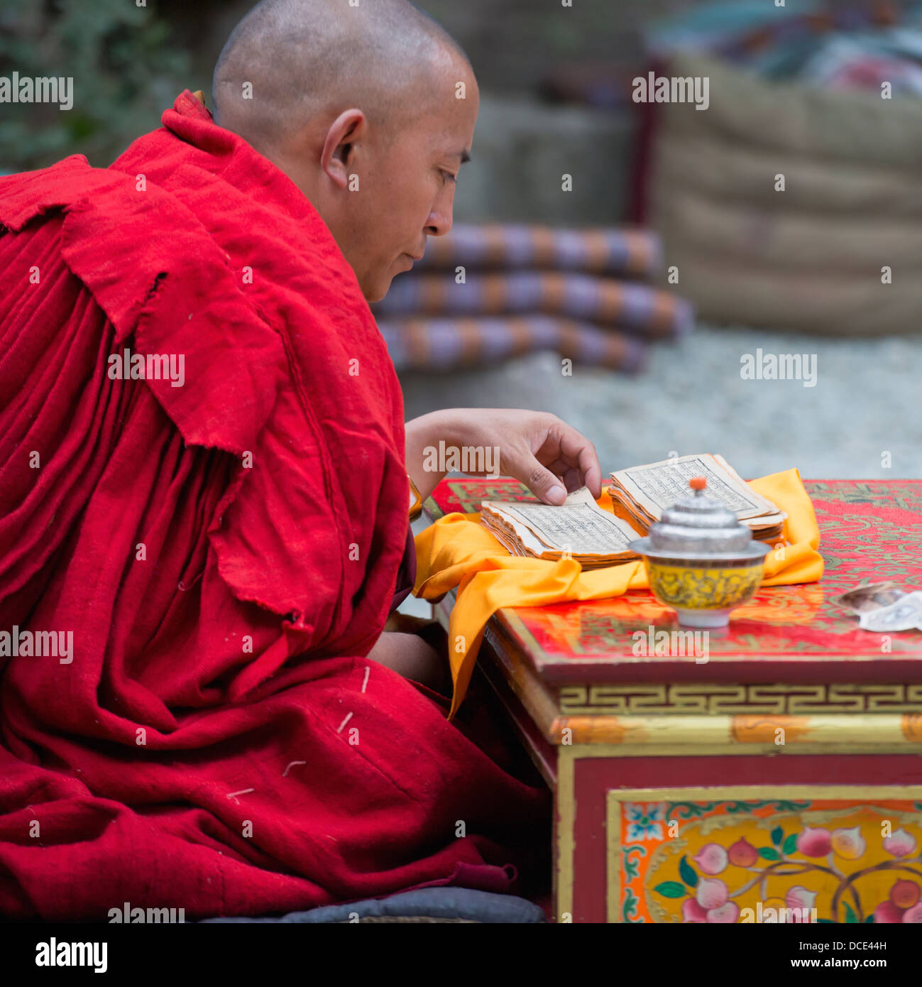 China, Xizang, Tibet, Lhasa, Monk Reading About Teachings Of Buddha At ...