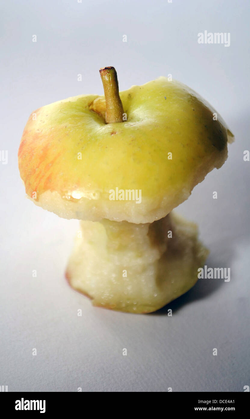 Apple core shot as if a portrait Stock Photo - Alamy