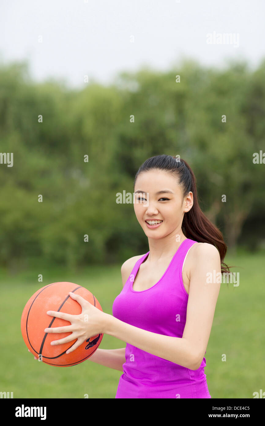 Girl spinning basketball hi-res stock photography and images - Alamy