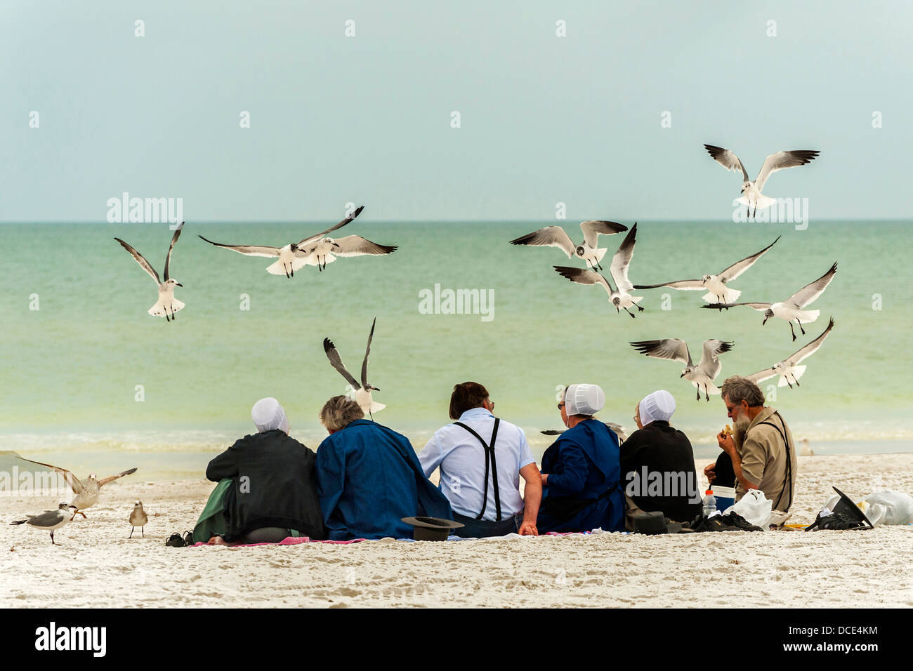 USA, Florida, Sarasota, Siesta Beach. Amish residents spend the morning ...