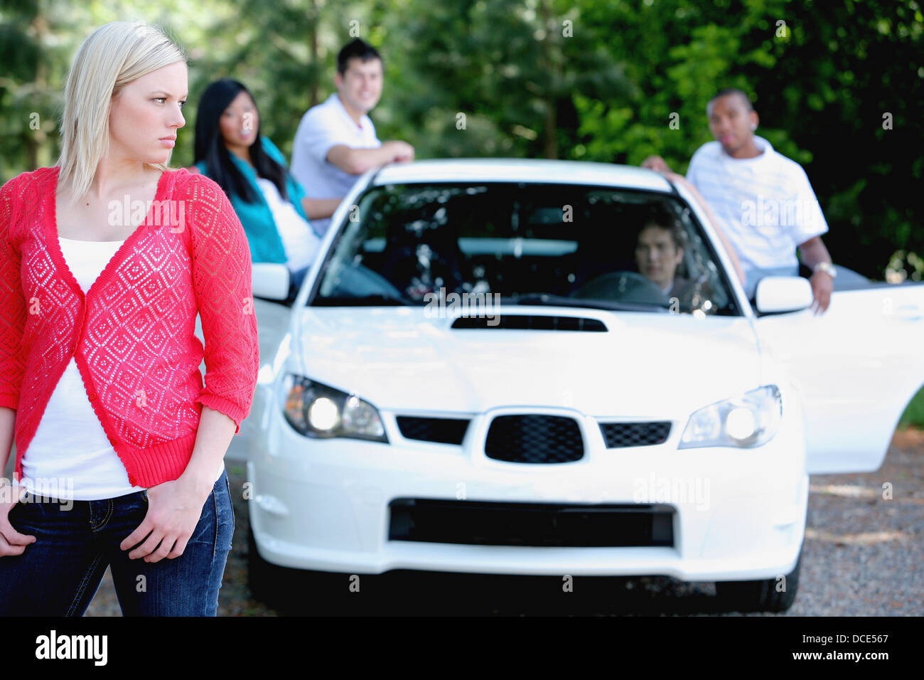 Angry Woman Separate From Friends Stock Photo - Alamy