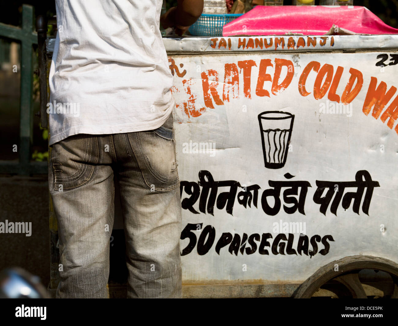 Male food vendor stands hi-res stock photography and images - Alamy