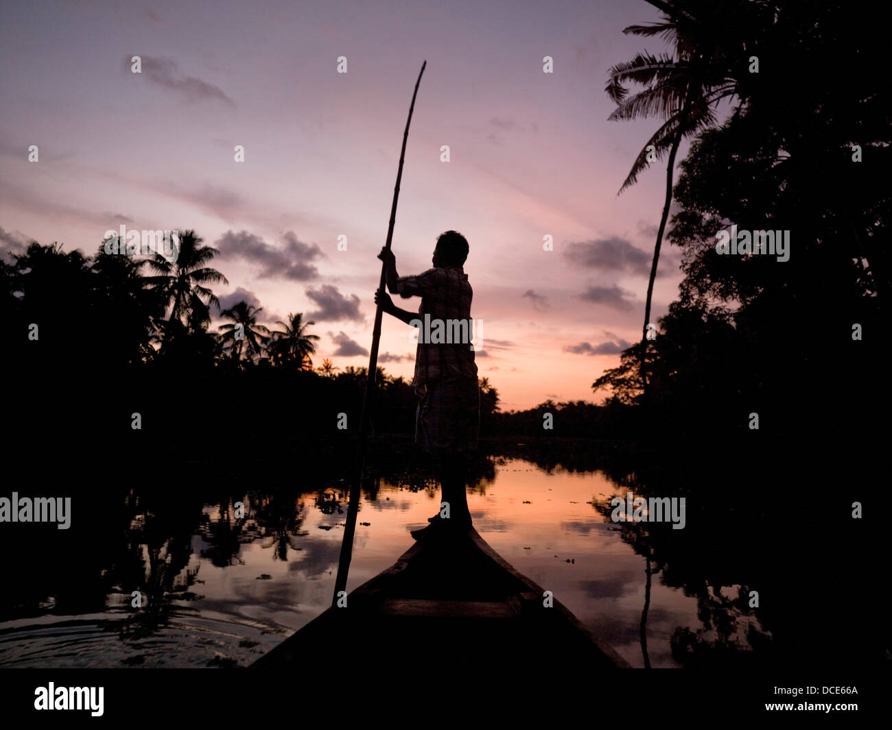 Man Punting A Boat Down A River; Kerala,India Stock Photo - Alamy