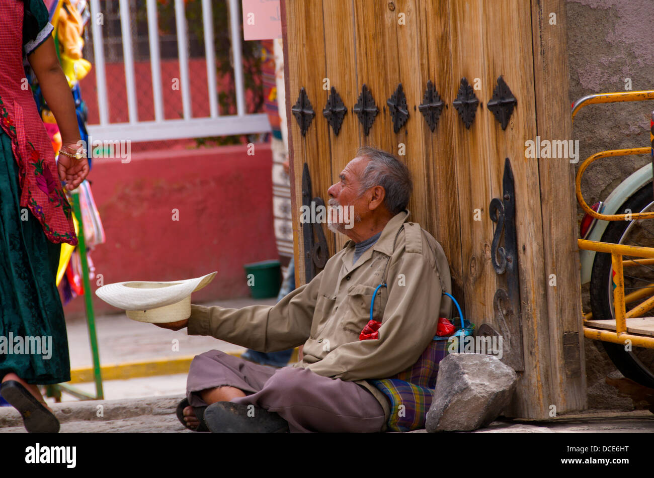 old mexican men waiting outside the church Stock Photo - Alamy