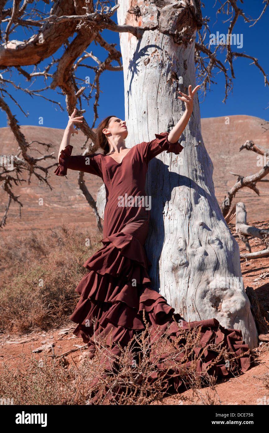 flamenco and a dead tree, art, life and death Stock Photo - Alamy