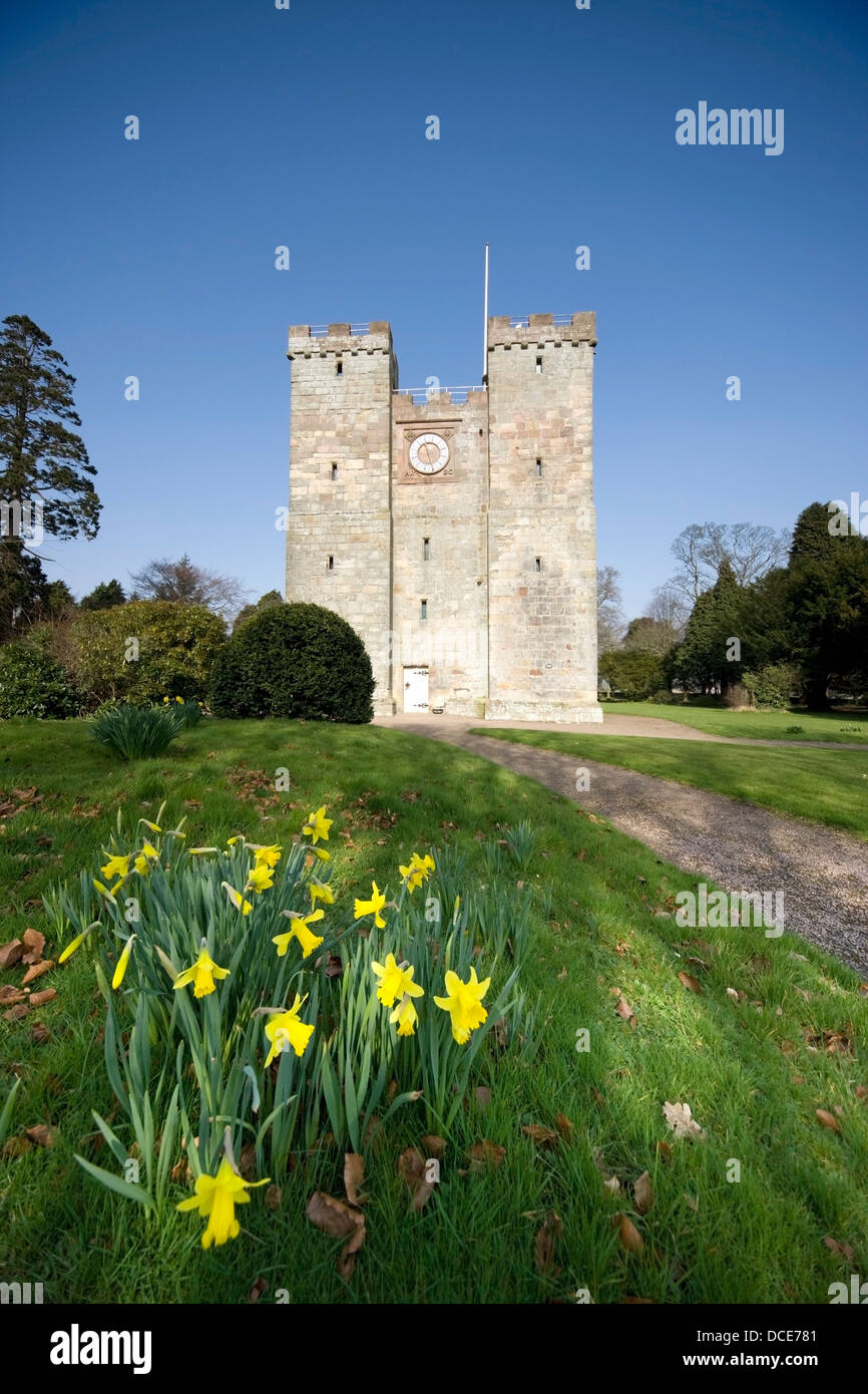 A Stone Building With A Clock Stock Photo - Alamy