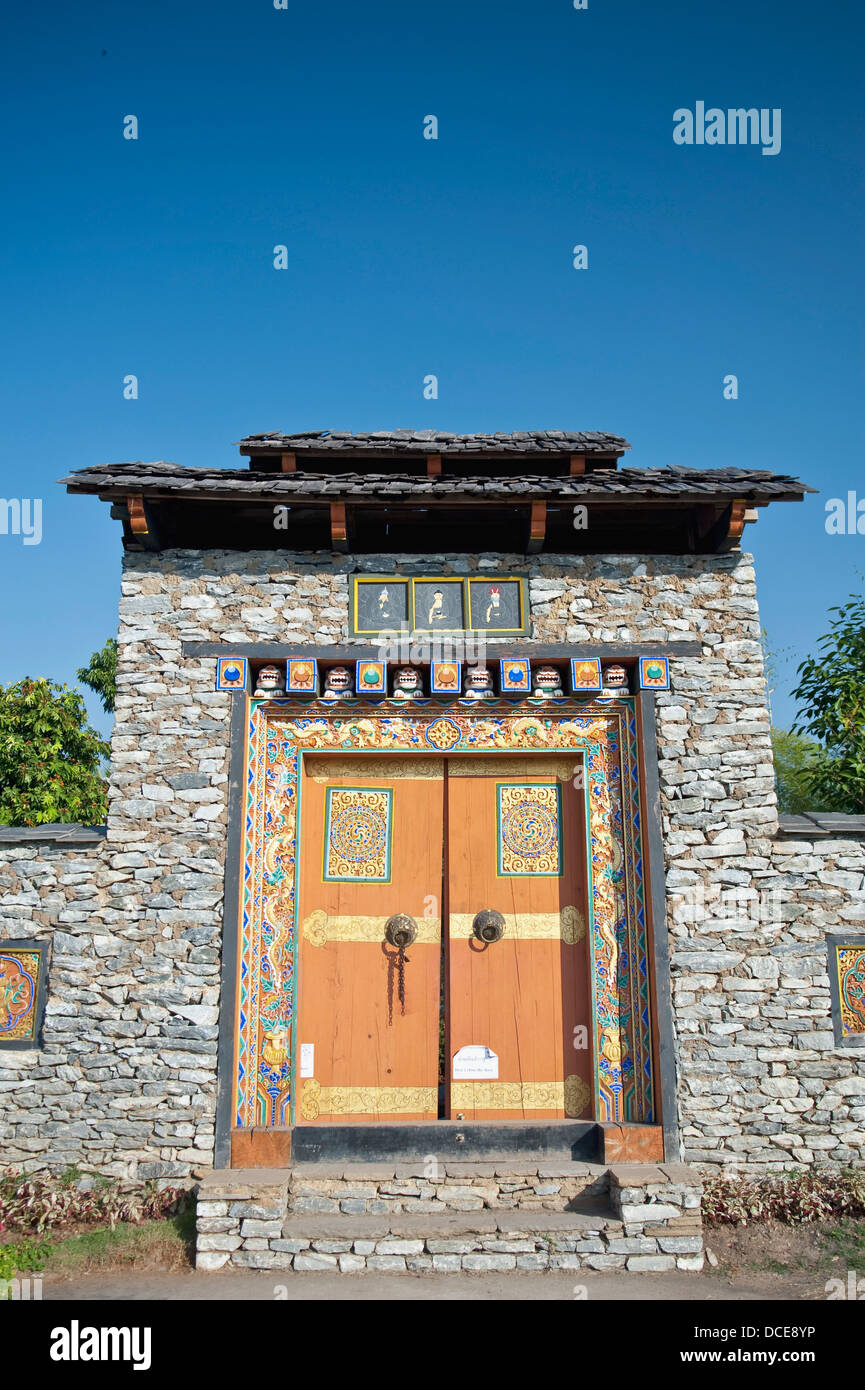 Bhutanese Painting On A Door In Rock Wall, Bhutan Stock Photo - Alamy