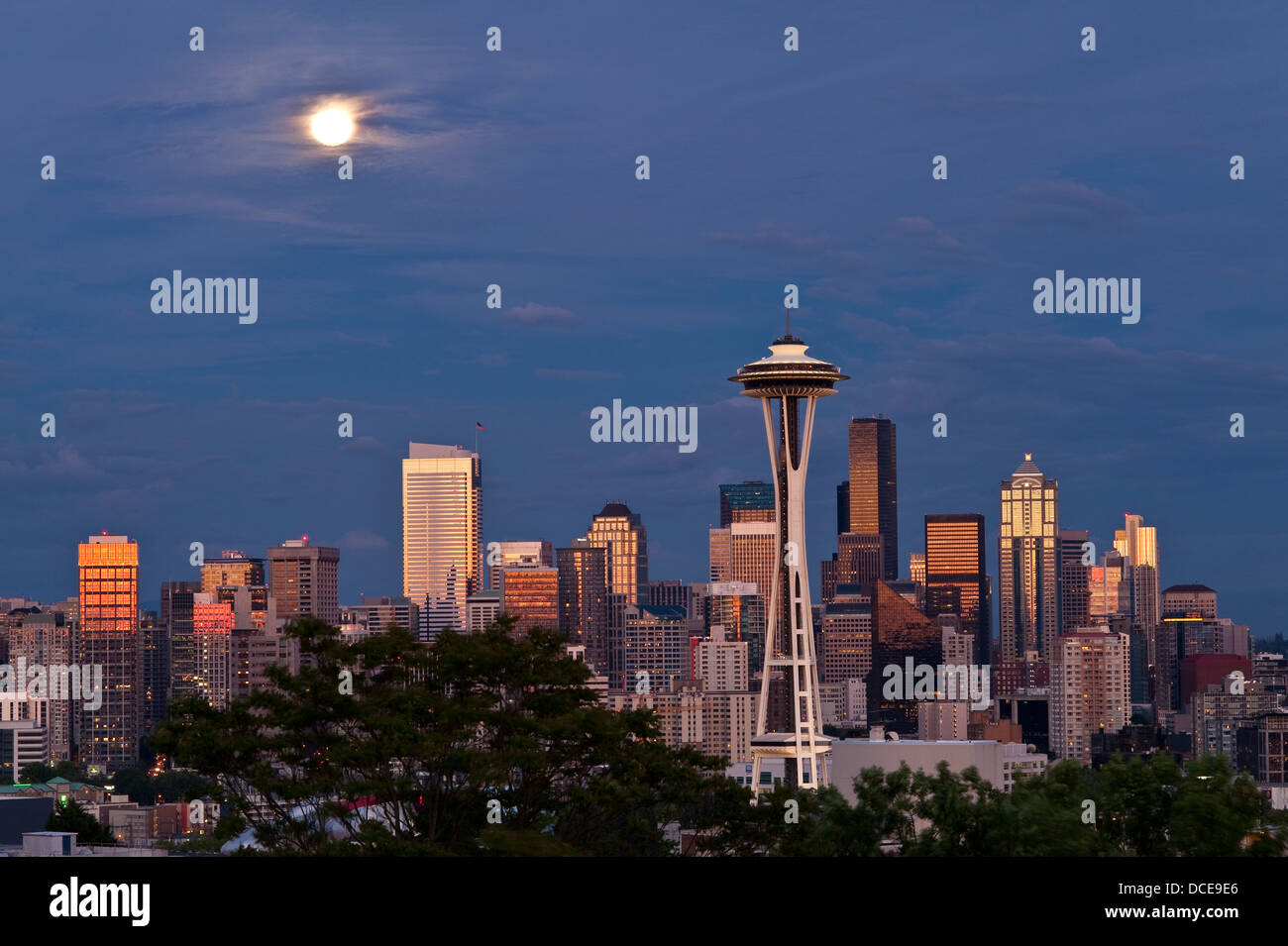 Retro image of Seattle downtown with moonrise and beautiful sunset ...