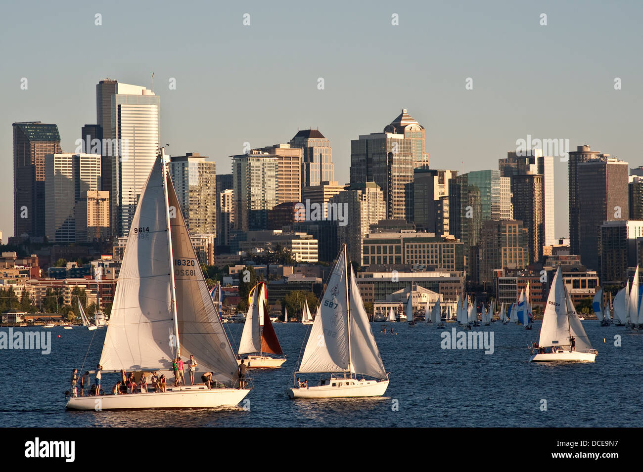 Retro image of Seattle skyline with sailboats racing on Lake Union ...