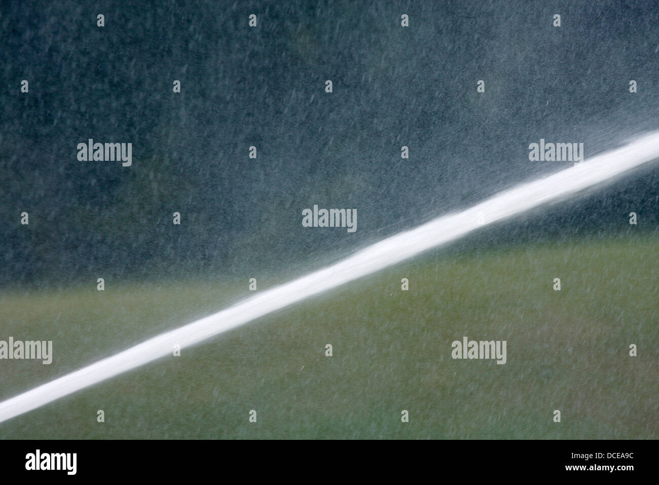 A water line spray from a fire department hoseline Stock Photo - Alamy