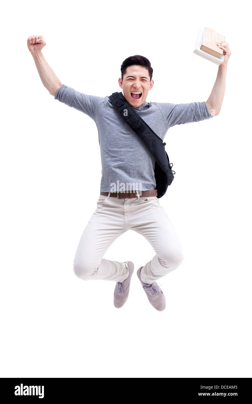 Male college student cheering Stock Photo - Alamy