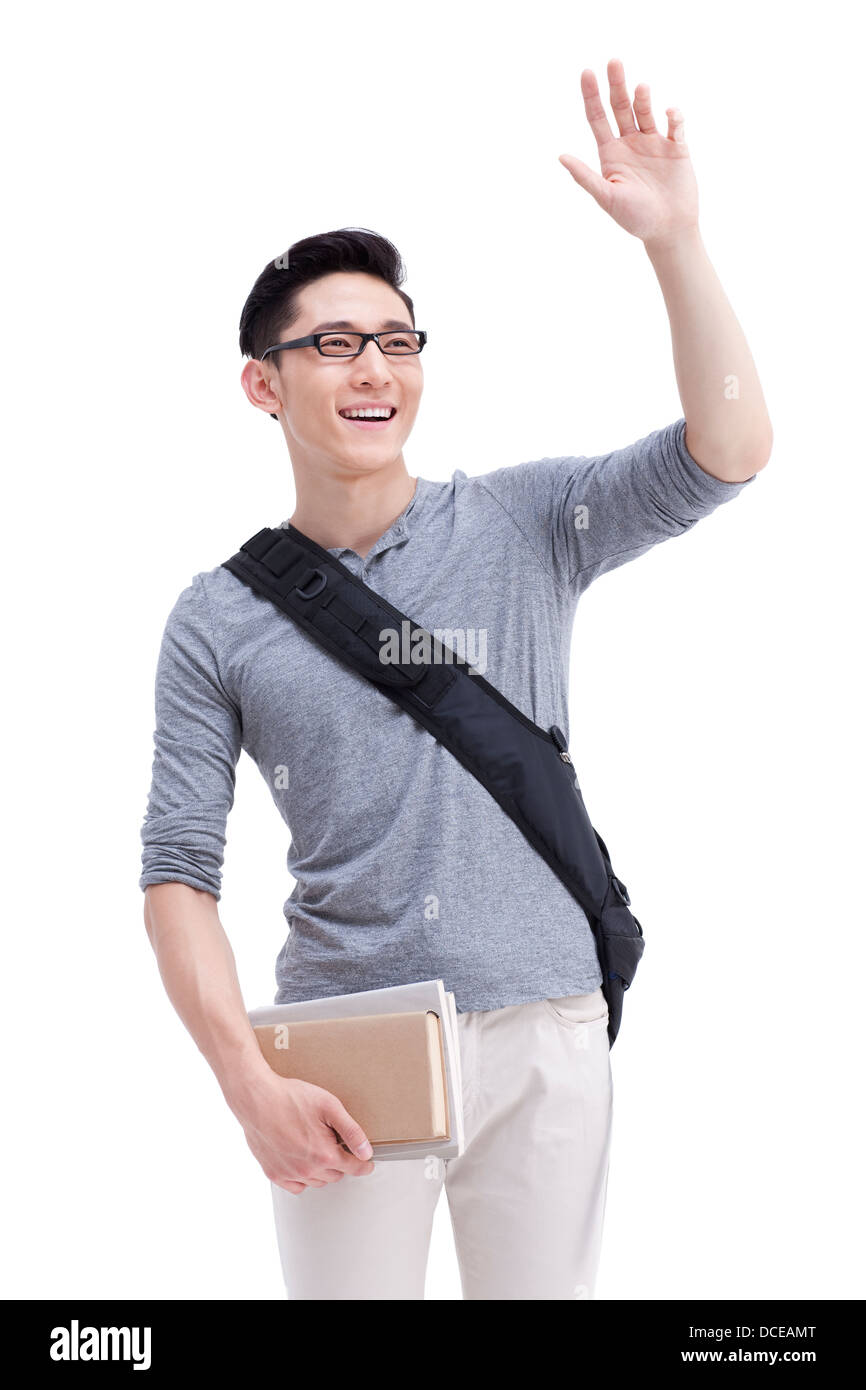 Male college student waving Stock Photo - Alamy