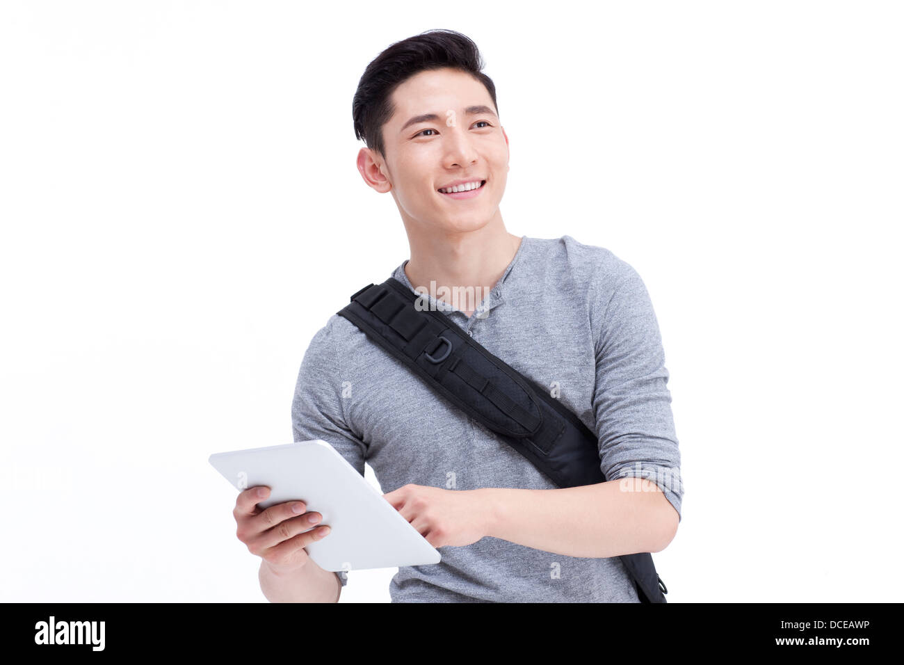 Happy student pointing digital hi-res stock photography and images - Alamy