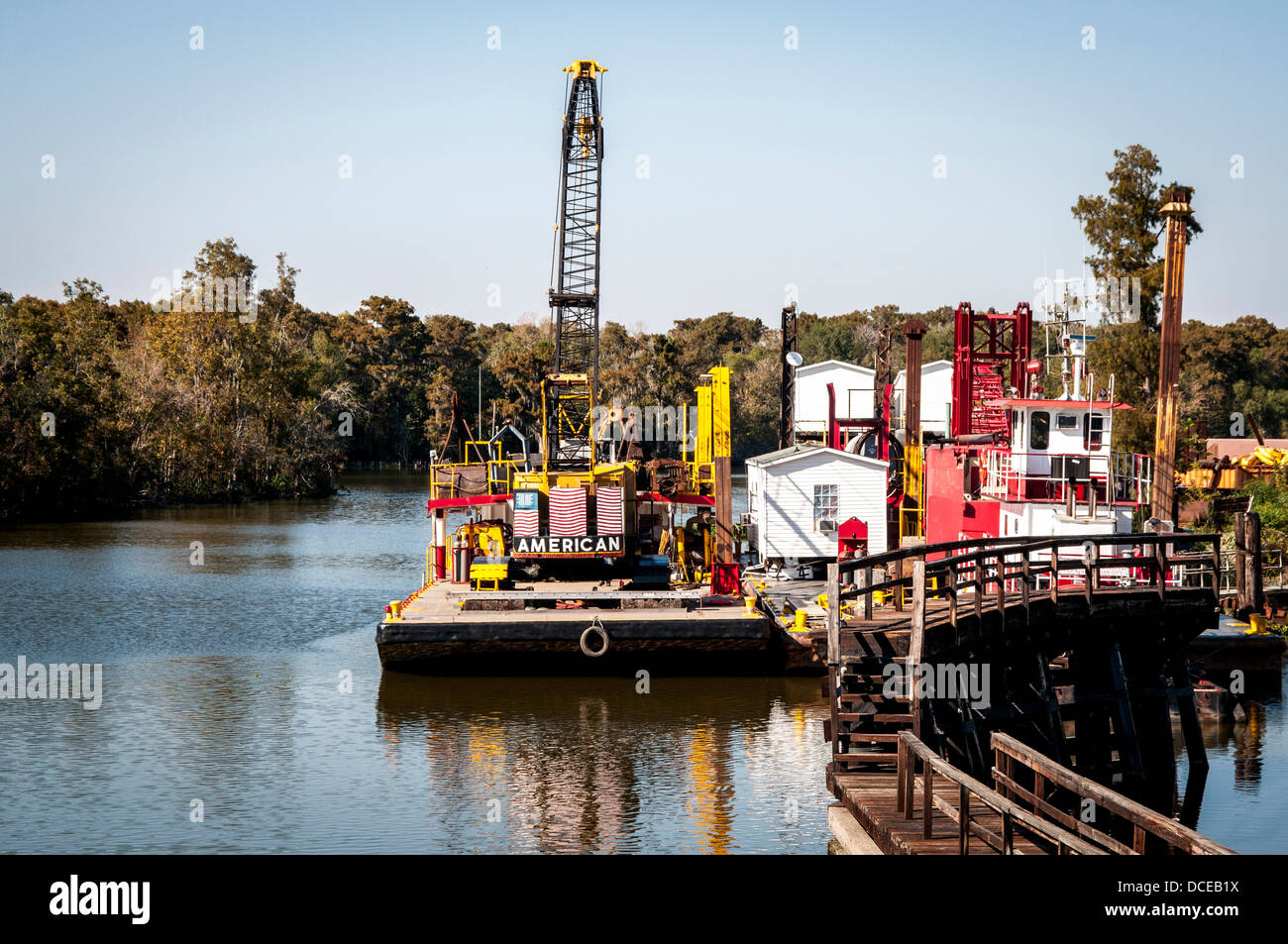 USA, Louisiana, Atchafalaya Basin, LAD Services barge at shipyard with ...