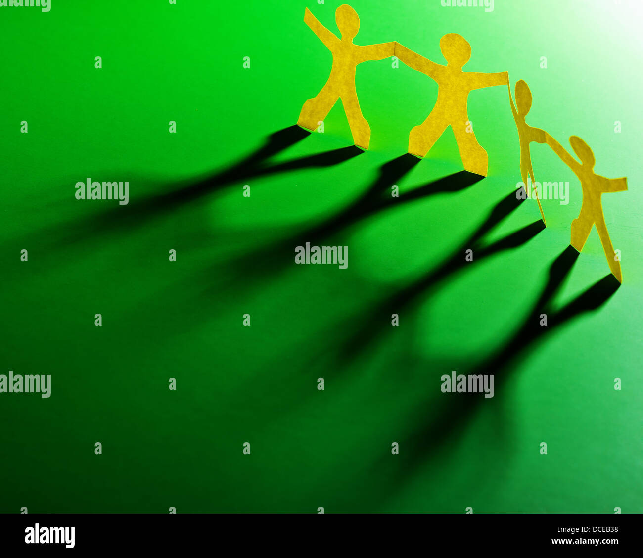 Paper people in teamworking concept Stock Photo - Alamy