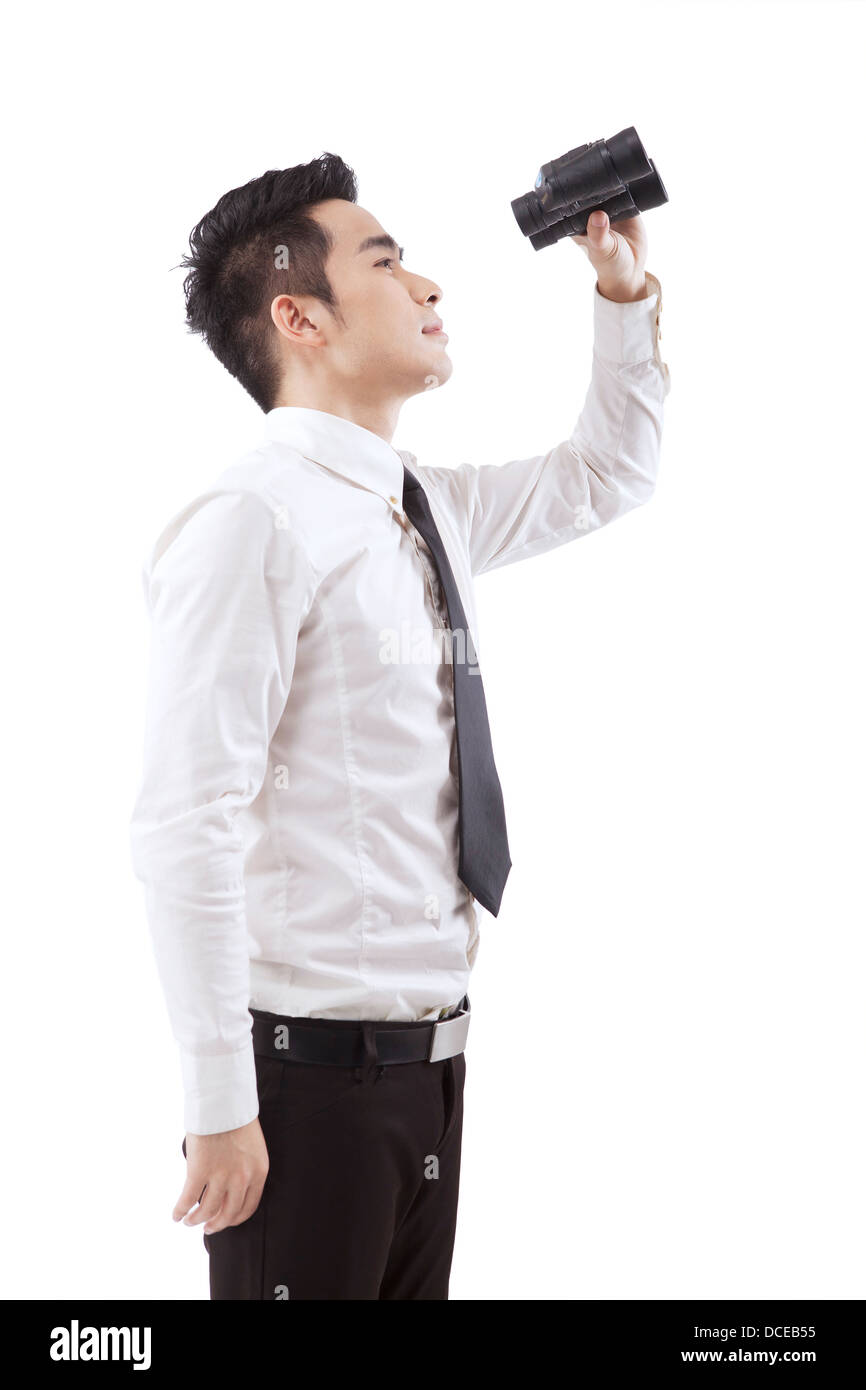 Business people using telescope Stock Photo - Alamy