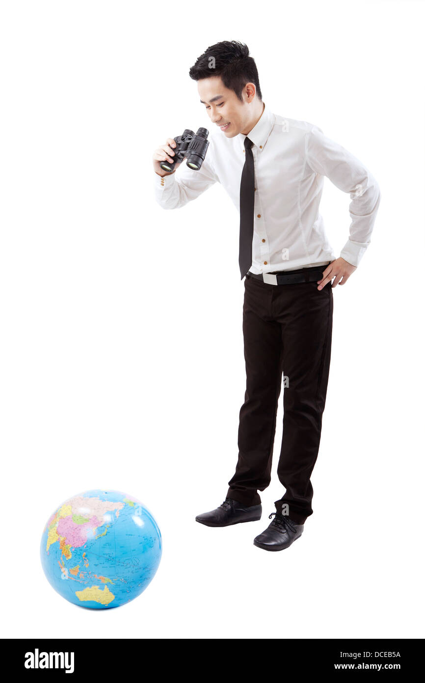 Business people use telescope Stock Photo - Alamy