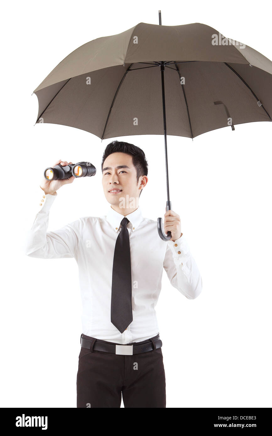 Business people using telescope Stock Photo - Alamy