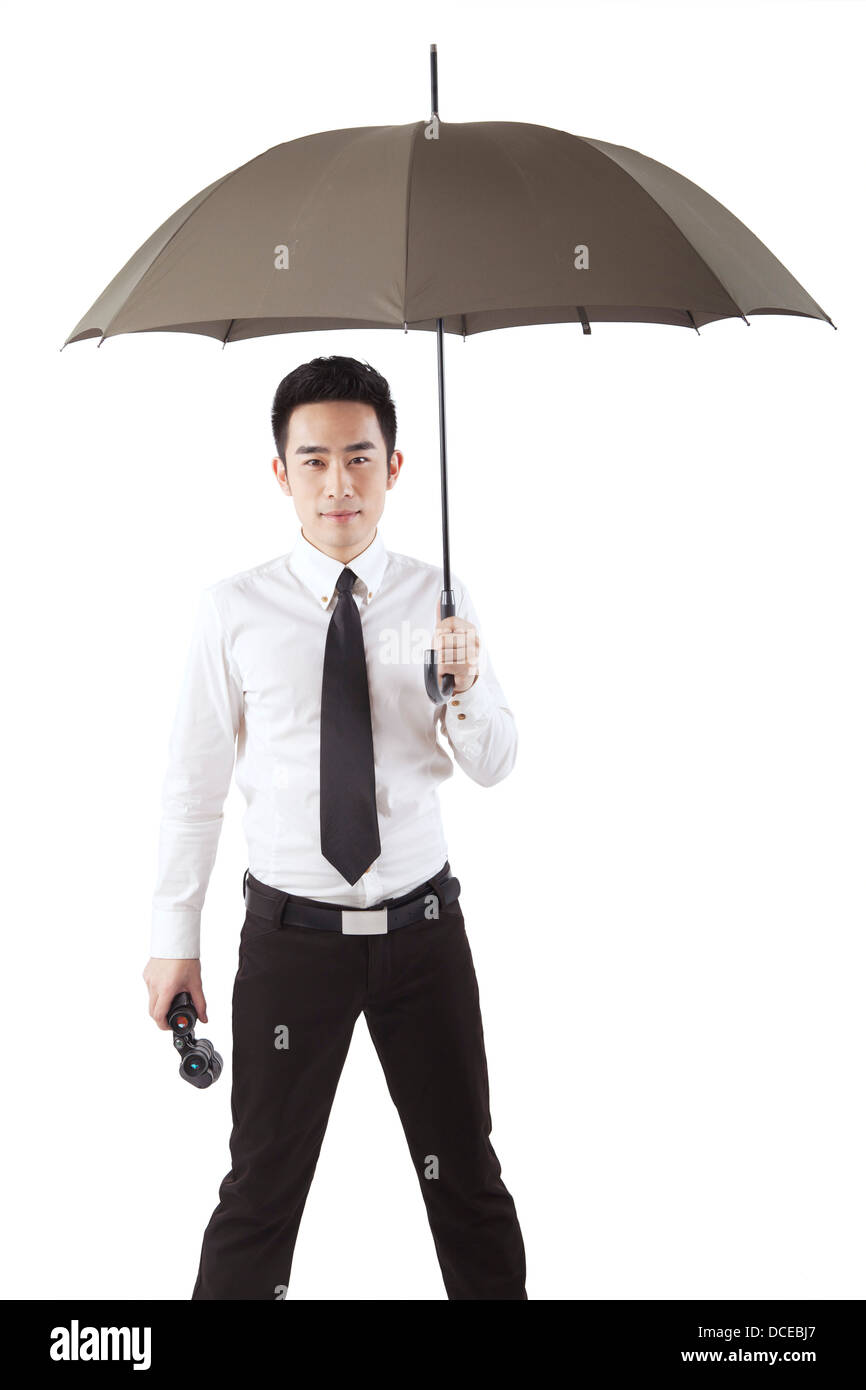 Business people using telescope Stock Photo - Alamy