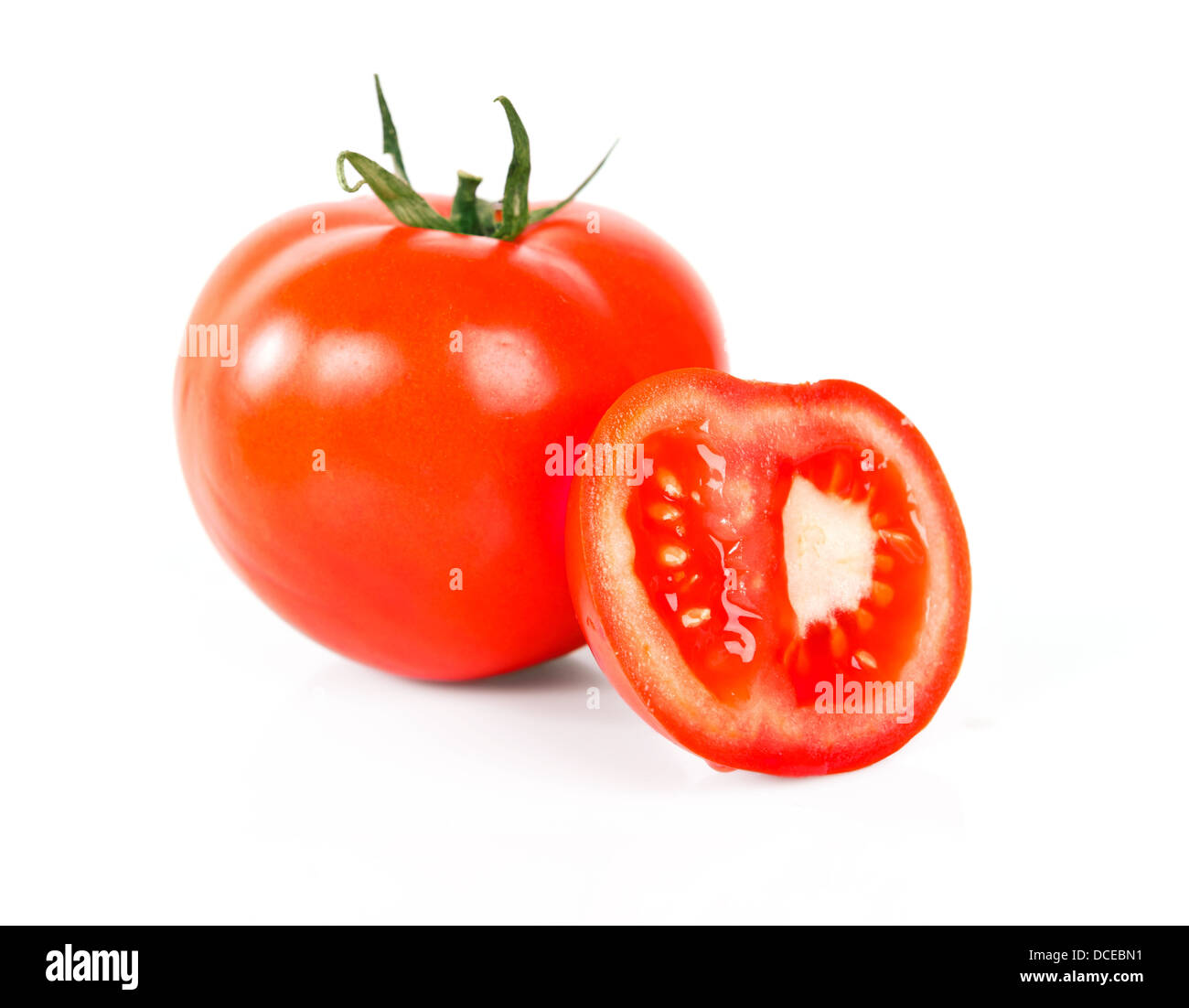 red tomato vegetable with cut isolated on white background Stock Photo ...