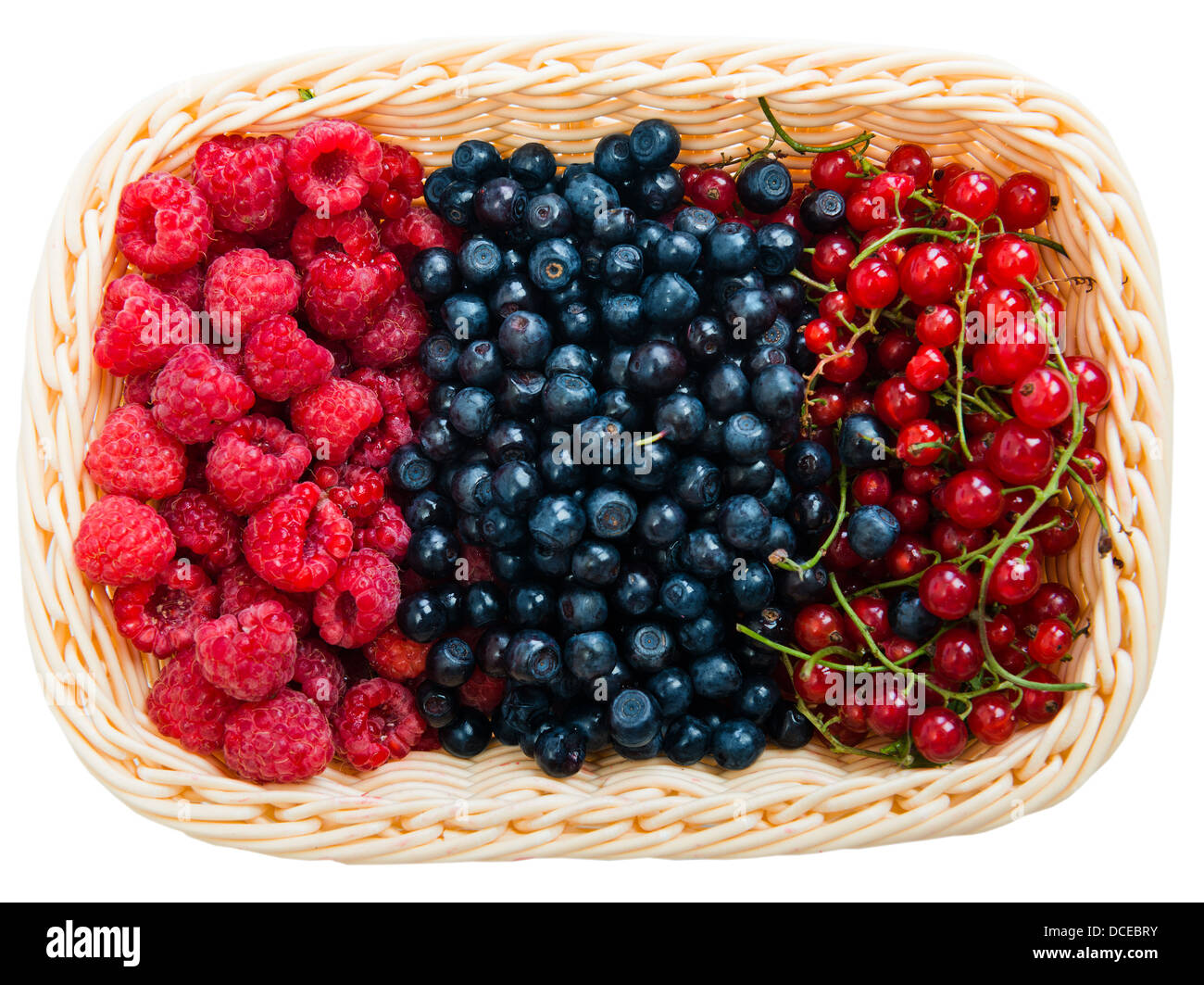 Mix of different berries in basket Stock Photo - Alamy
