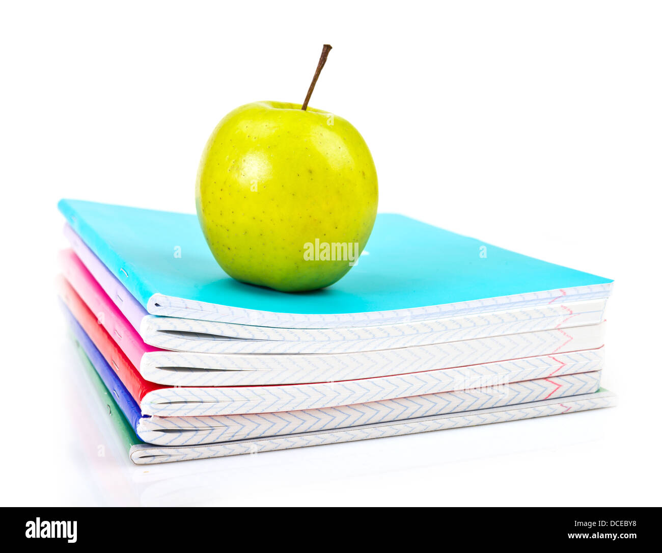 apple on writing-books. school concept Stock Photo - Alamy