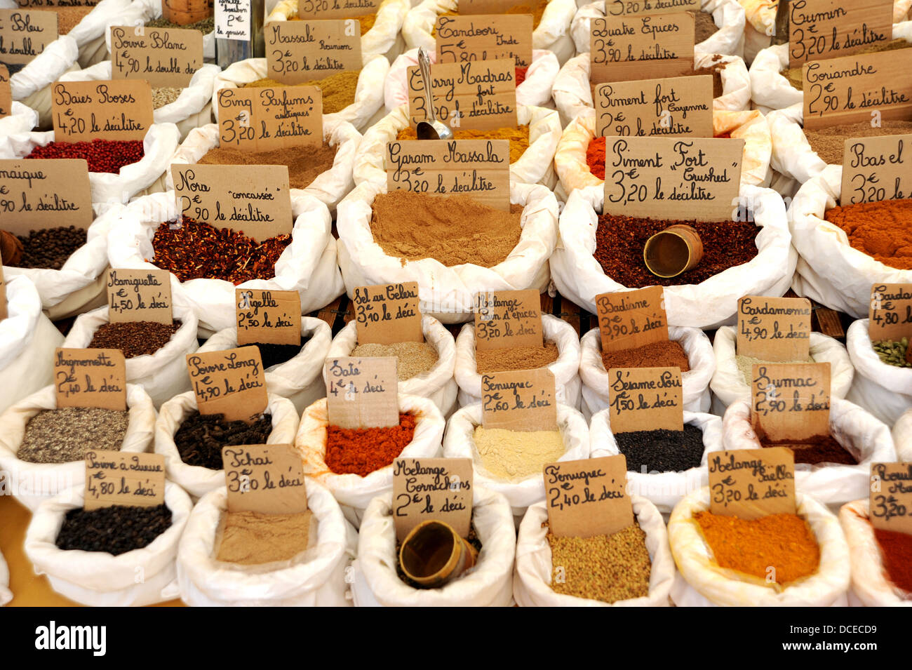 Spice and dried herbs stall at Prayssac market in the Lot Region or ...