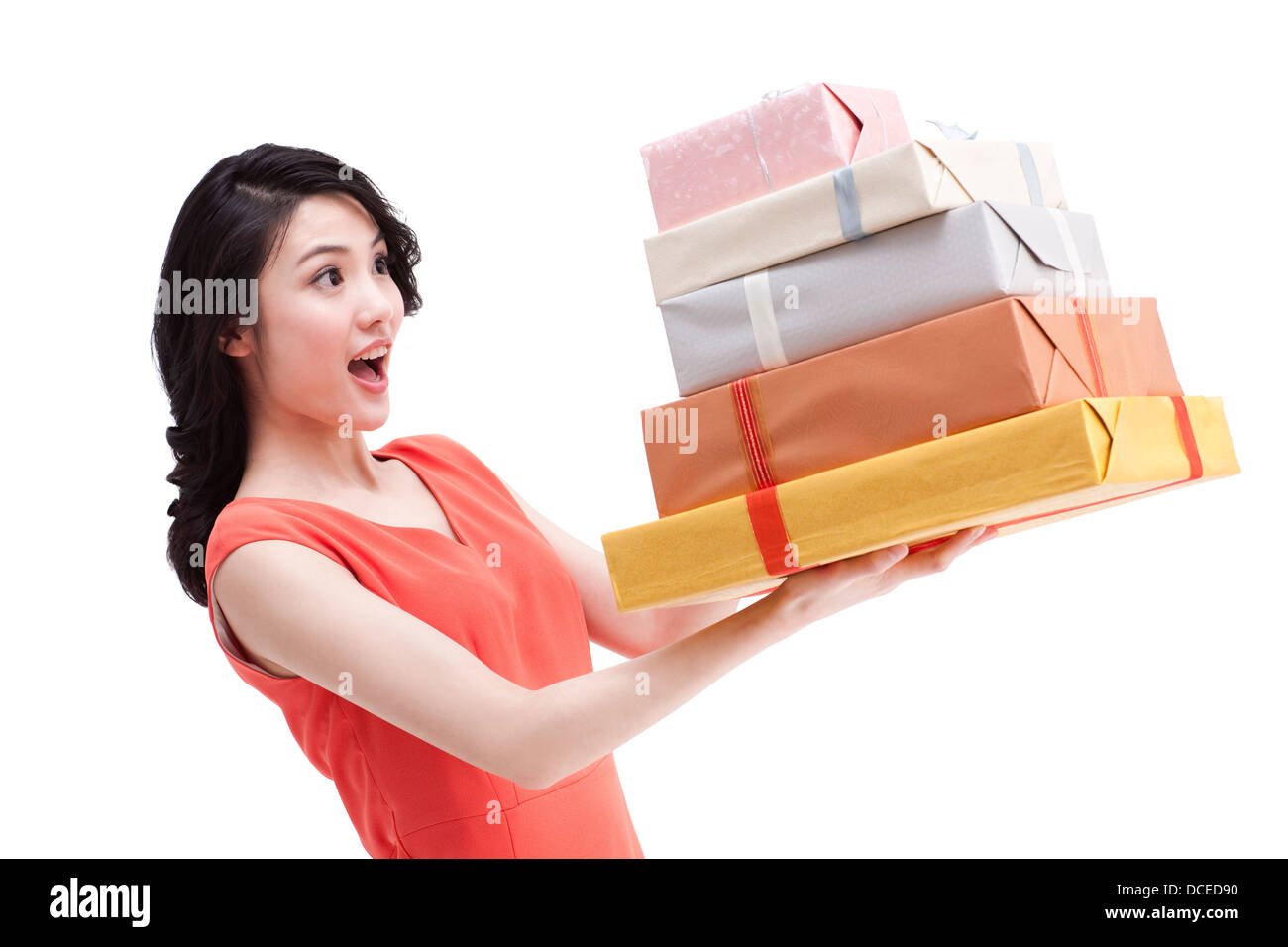 Cheerful young woman shopping Stock Photo - Alamy