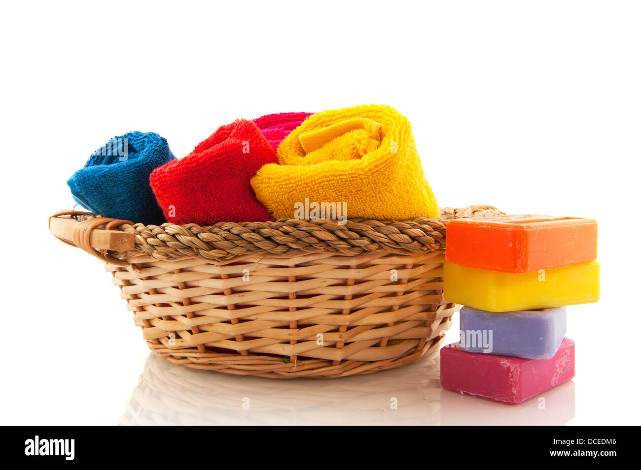 Rolled towels and soap Stock Photo - Alamy