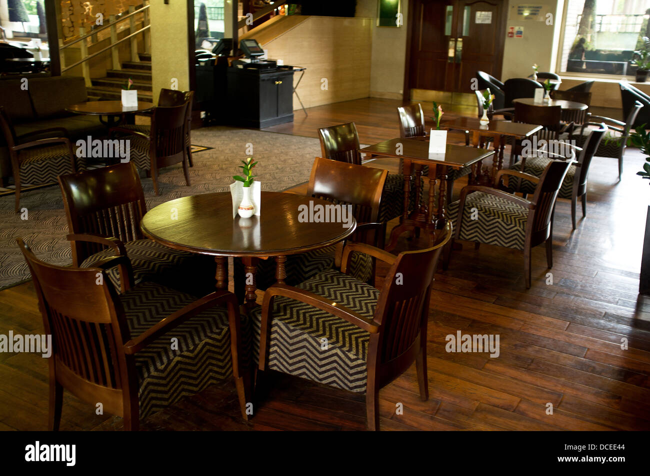 Luxurious dining area of a hotel. Tables for few Stock Photo - Alamy
