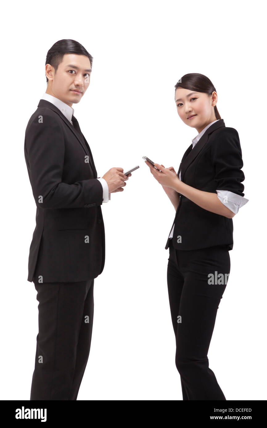 Business people using mobile phone Stock Photo - Alamy