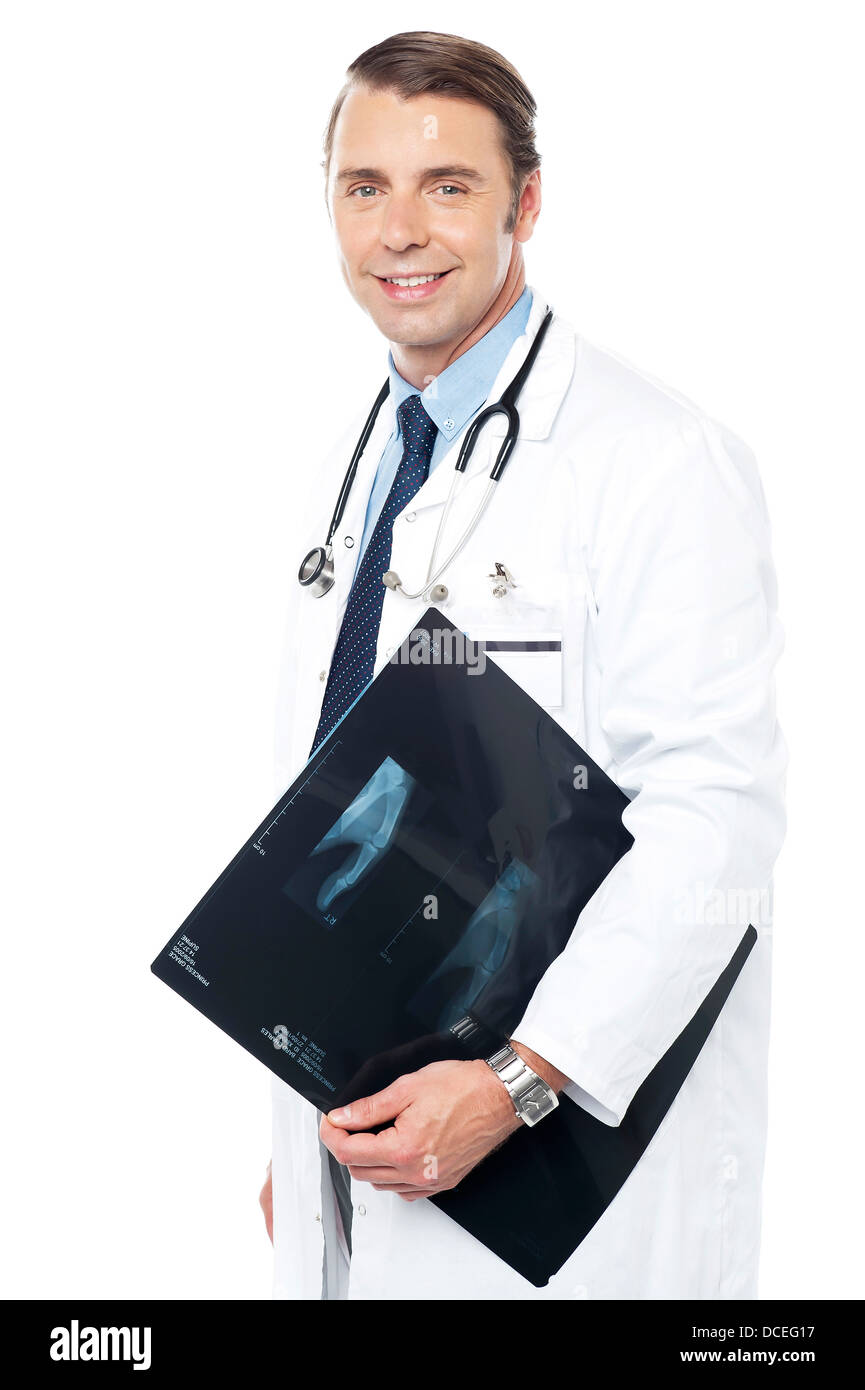 Smart surgeon holding x-ray report of a patient isolated against white ...