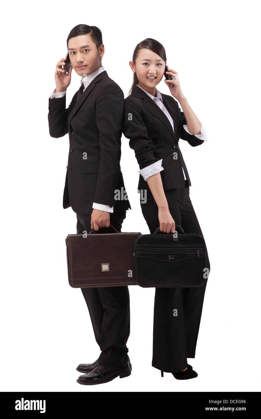 Business people with a briefcase call Stock Photo - Alamy