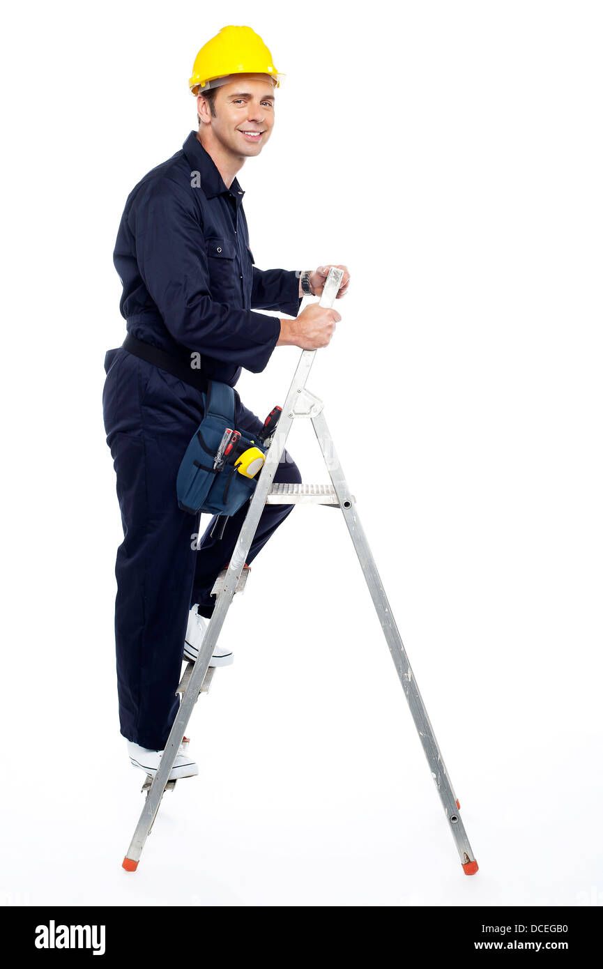 Young man stepping up for success Cut Out Stock Images & Pictures - Alamy