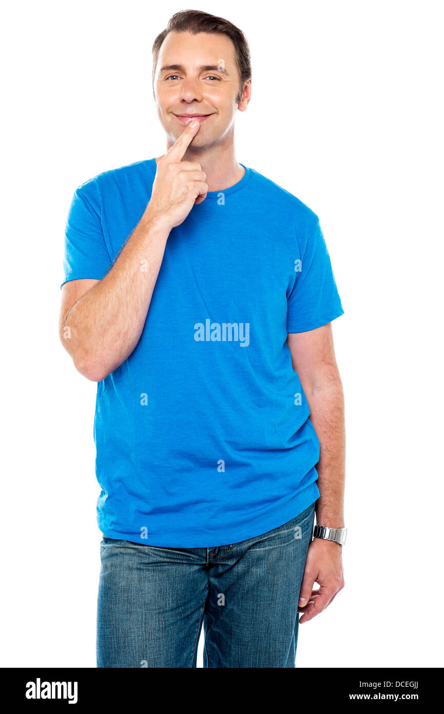 Young guy blushing, posing in casuals. All on white background Stock ...