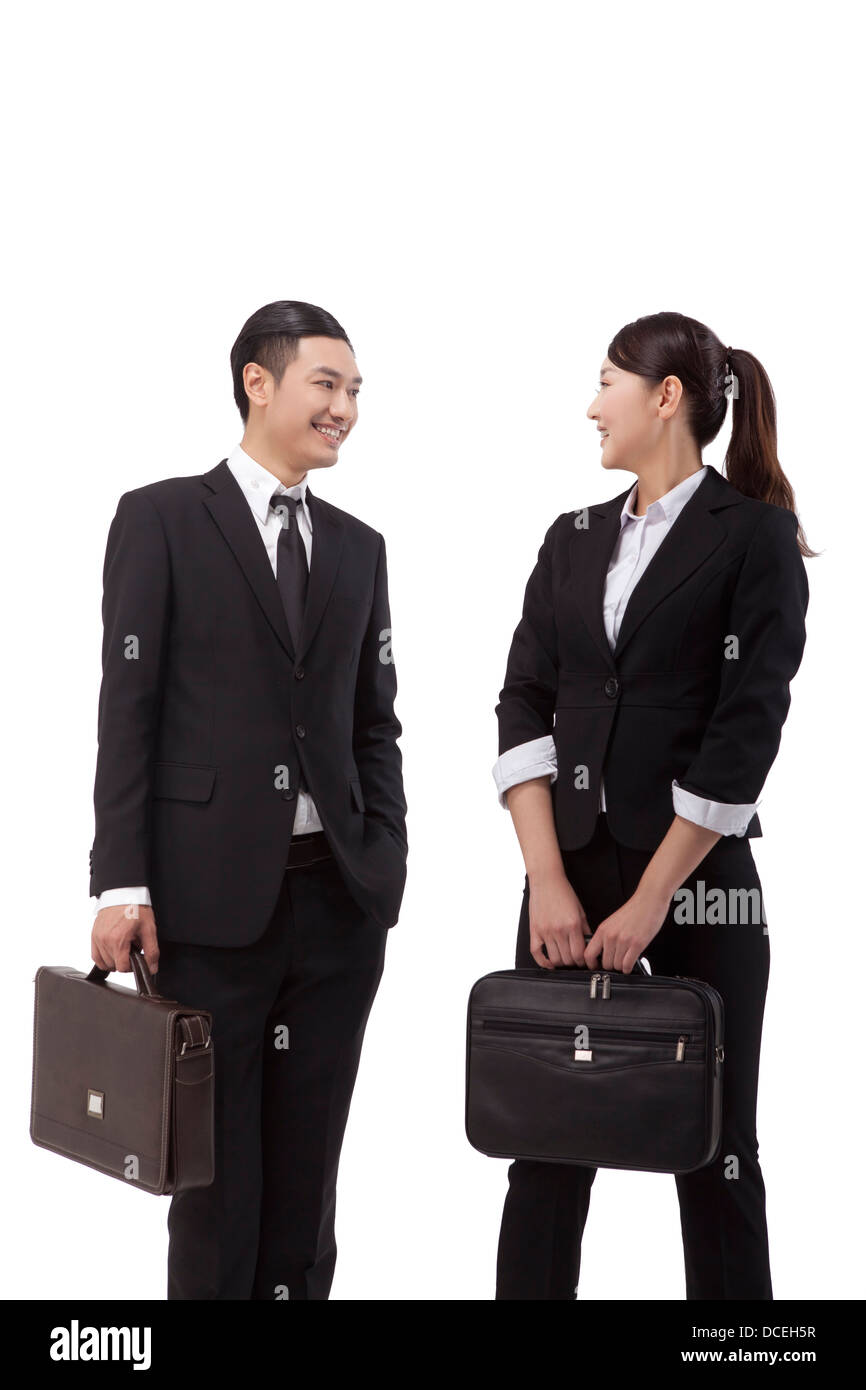 Two young people talking and asian Cut Out Stock Images & Pictures - Alamy