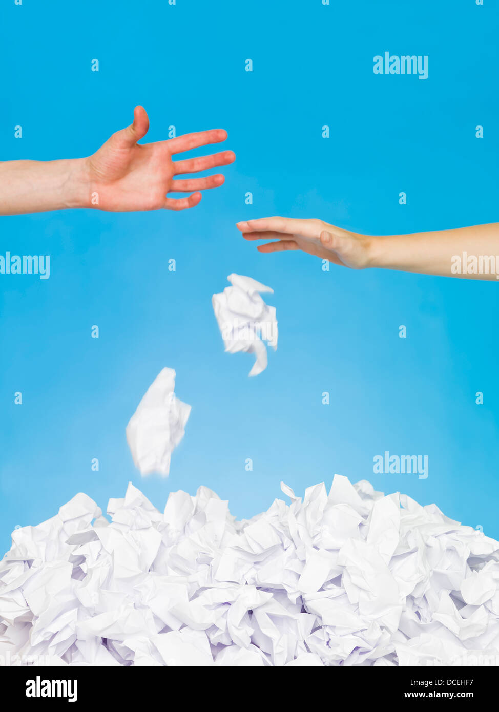 Hands trowing papers Stock Photo - Alamy